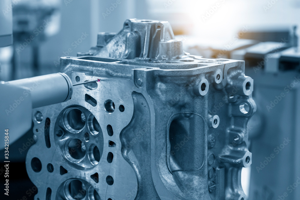 The multi-axis,CMM probe measure dimension of the aluminium casting ...