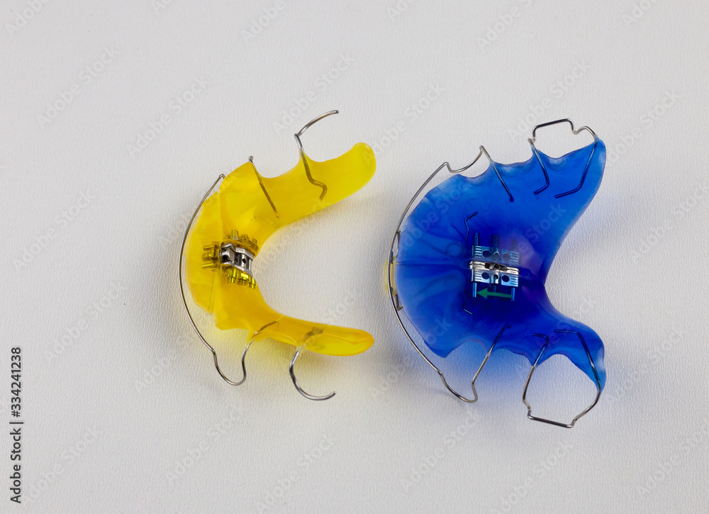 Dental plates isolated on white background.An alternative to braces for ...