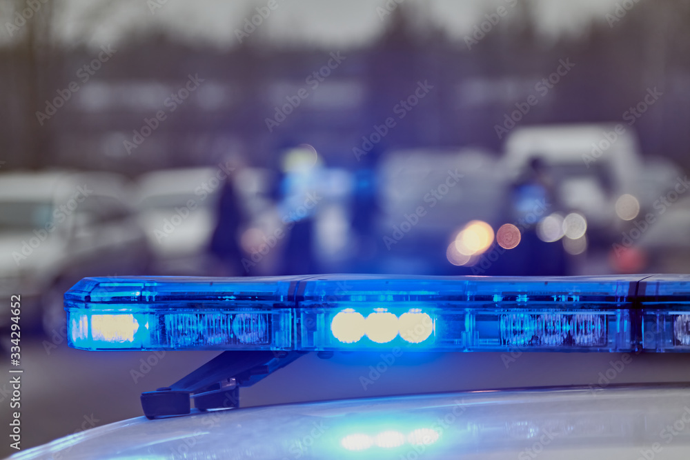 Blue lights of a police car at the scene of an accident Stock Photo ...