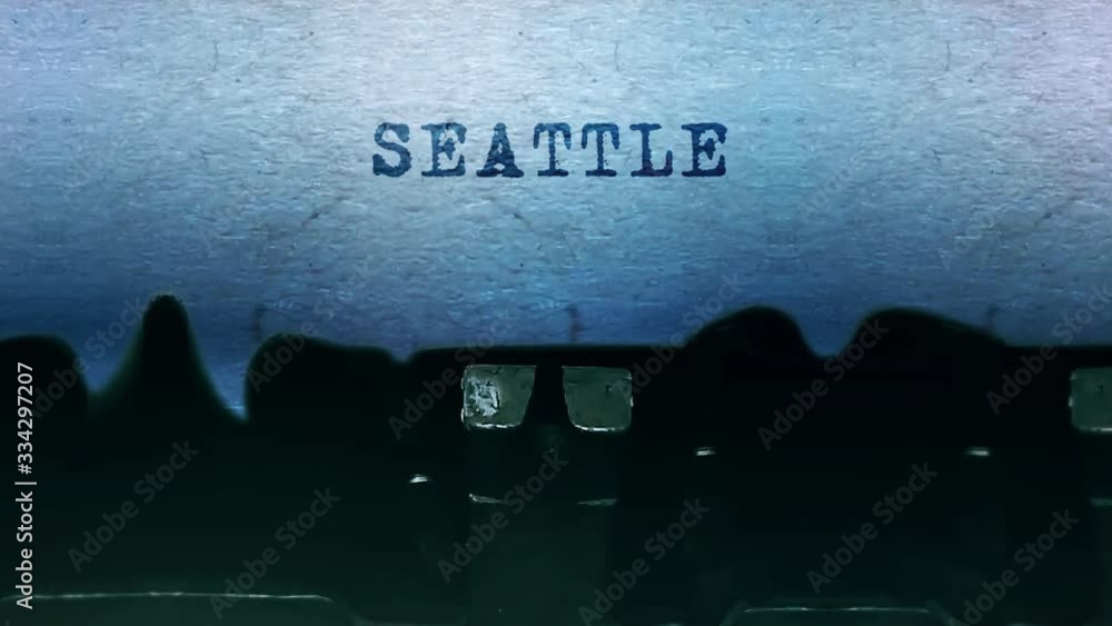 SEATTLE Word closeup Being Typing and Centered on a Sheet of paper on ...