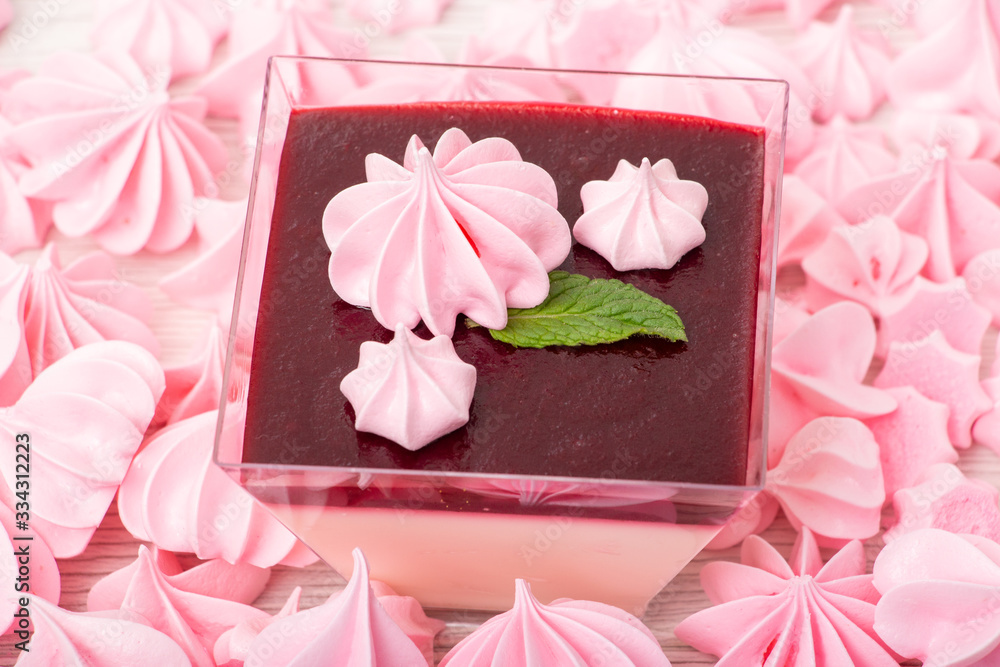 Panacota in a pink cup with marshmallows and Stock Photo | Adobe Stock
