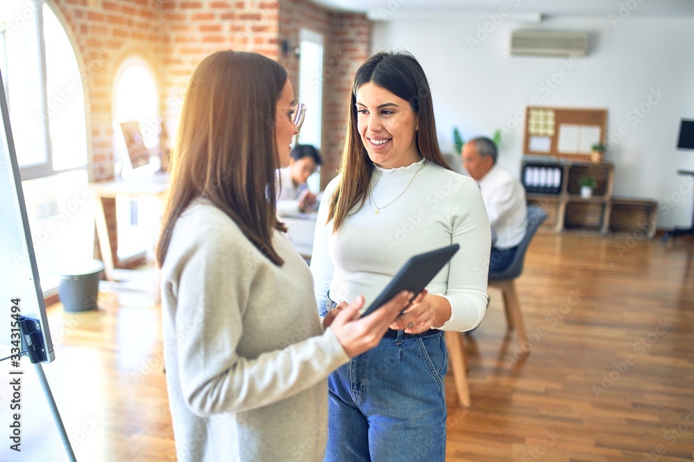 Business workers smiling happy. Standing with smile on face working ...