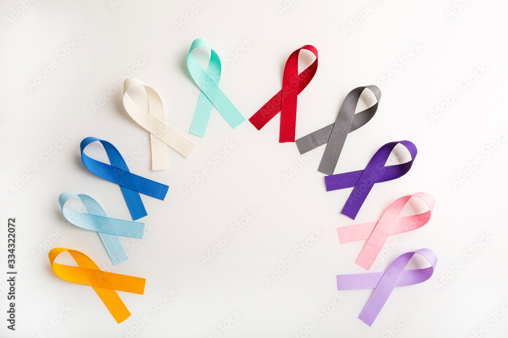 Colorful cancer ribbons as Health symbols for all types of cancer in a ...