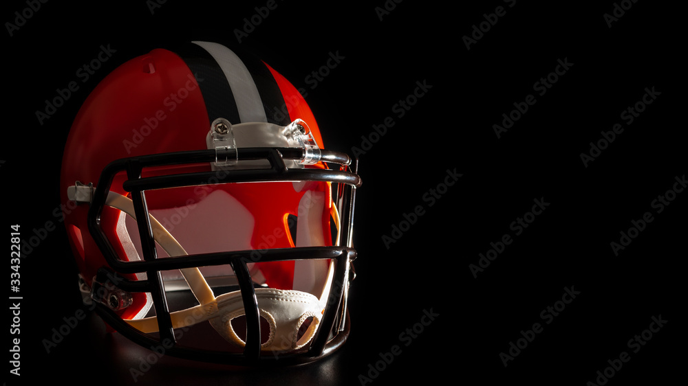 Dark side of college sports concept with high contrast lighting on ...