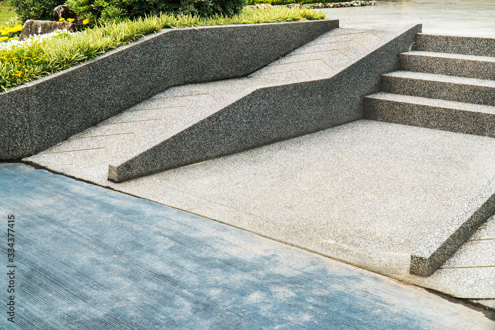 Ramp for the wheelchair and stairs for normal people adjoining. Stock ...