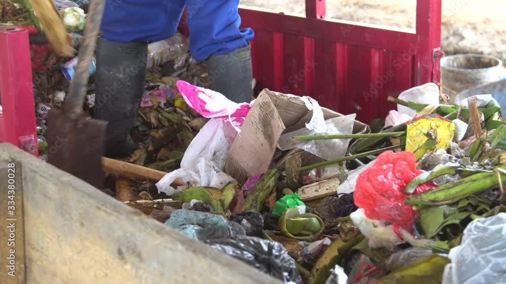 close-up. shovel rowing garbage. organics and plastic. waste treatment ...