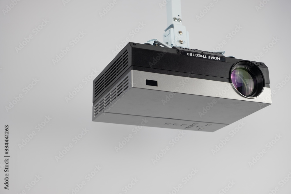 Poster Media projector hanging on the ceiling – Wall Art | UkPosters