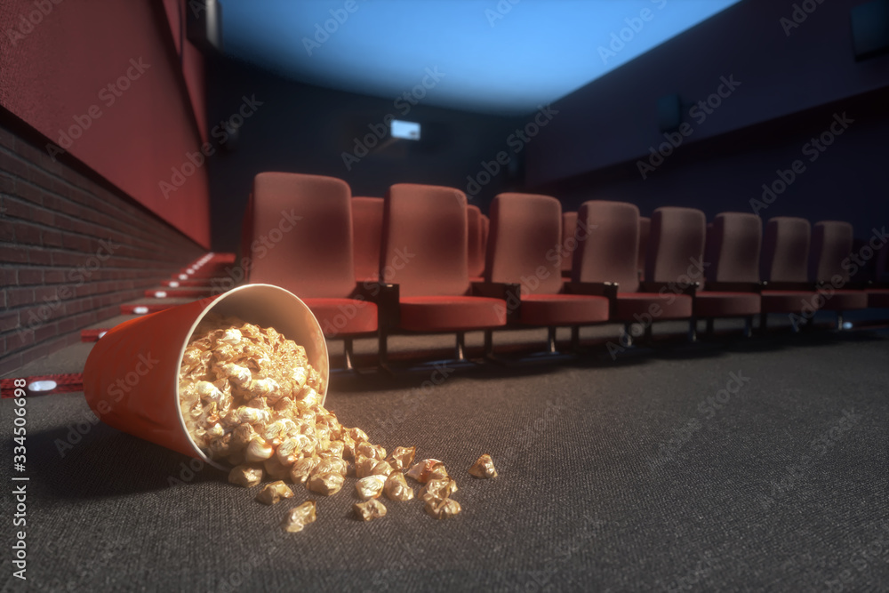 a fallen bucket of popcorn in an abandoned movie theater, during the ...