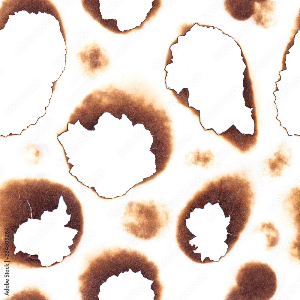 Seamless pattern with burned paper texture. Brown marks on paper from ...
