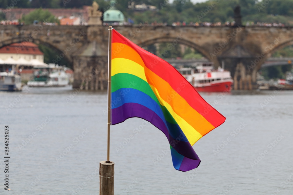 rainbow umbrella and flag in the river called Vltava in Prague. Stock ...