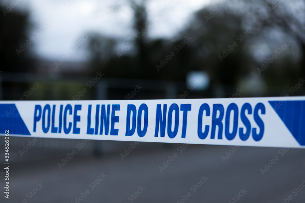 UK police tape marking a crime scene Stock Photo | Adobe Stock