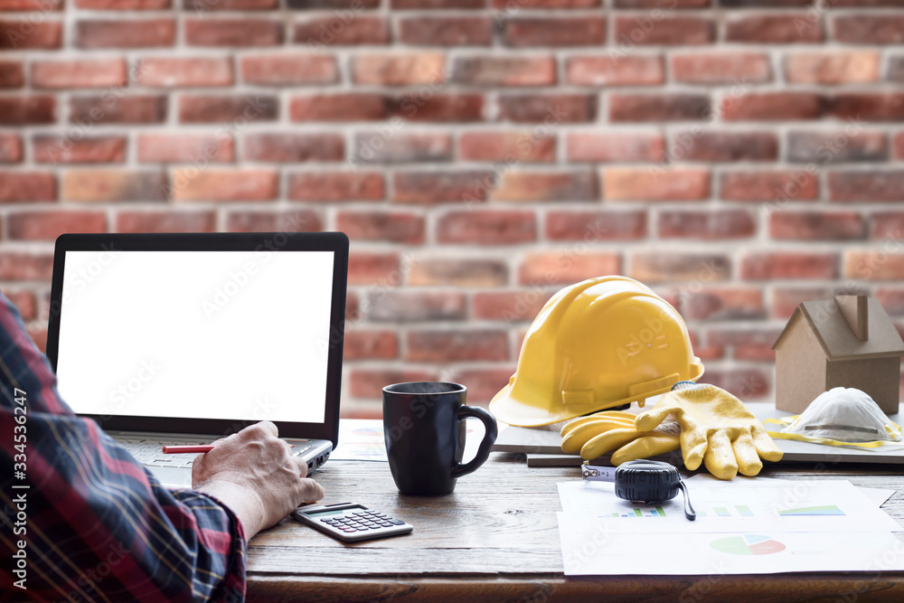 civil engineer helmet and laptop Stock Photo | Adobe Stock
