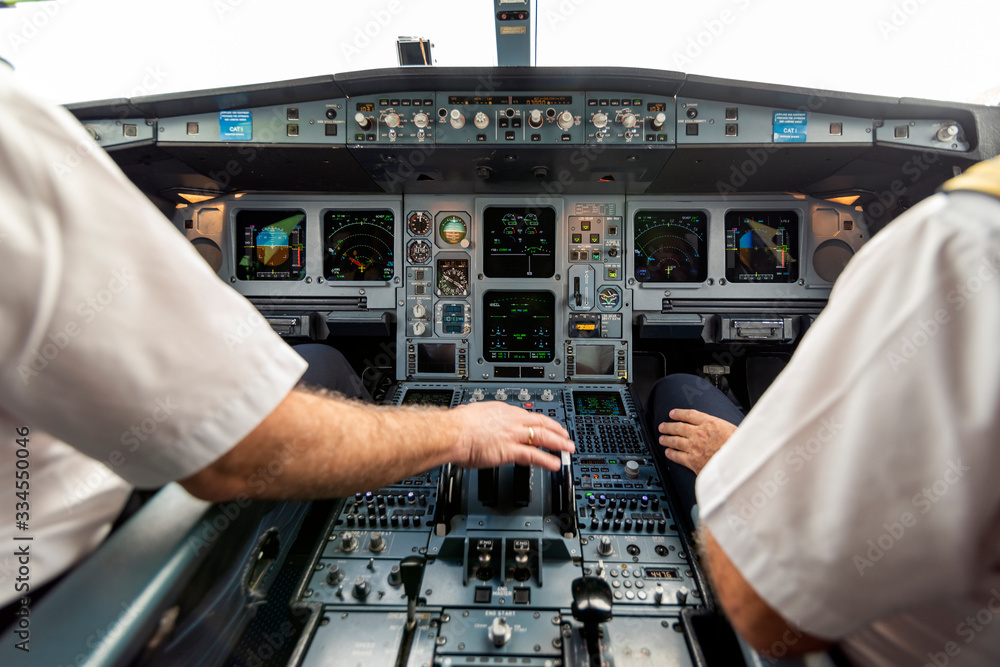 Cockpit view of an airplane in flight Stock Photo | Adobe Stock