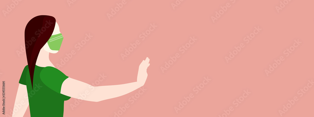 Woman wearing a mask with her hand out in a stop gesture to stop the ...