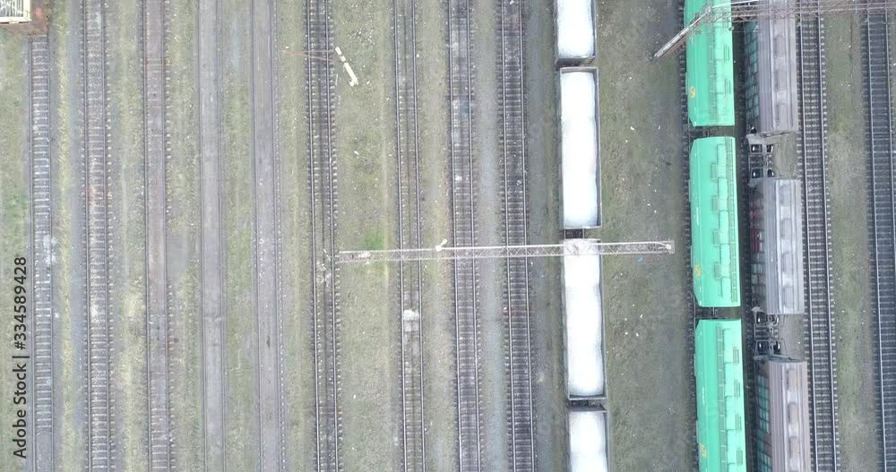 Cargo trains close-up. Aerial view of colorful freight trains on the ...