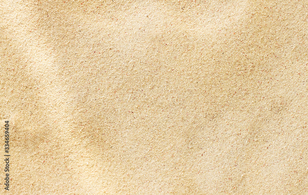 Soft light beige sand top view background with sunray, caribbean ...