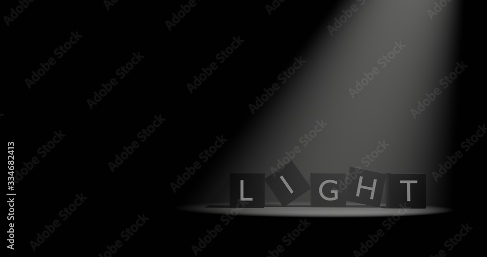 Light letter at black cube in volumetric spotlight with dark background ...