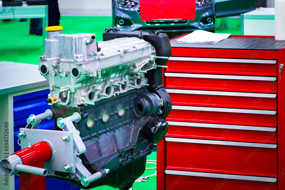 Car engine in a car workshop. The motor was pulled out for diagnosis ...