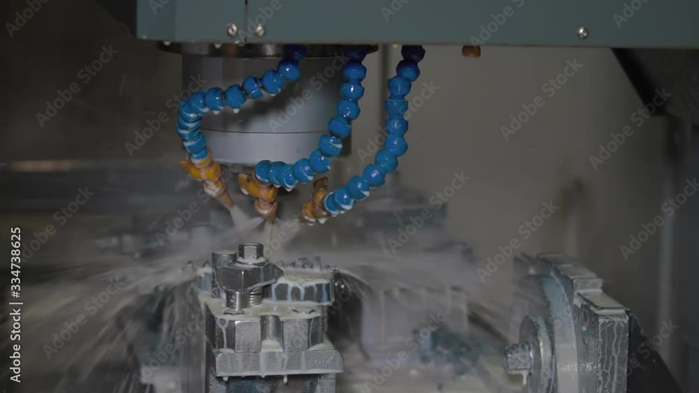 Metalworking milling machine. Produces metal detail in a factory ... Metalworking milling machine. Produces metal detail in a factory ...