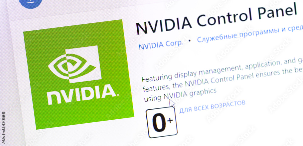 Nvidia logo app on the screen notebook closeup. Nvidia is an American ...