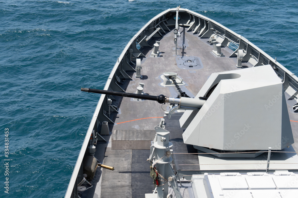 High technology modern naval main gun mounted on the stealth frigate ...
