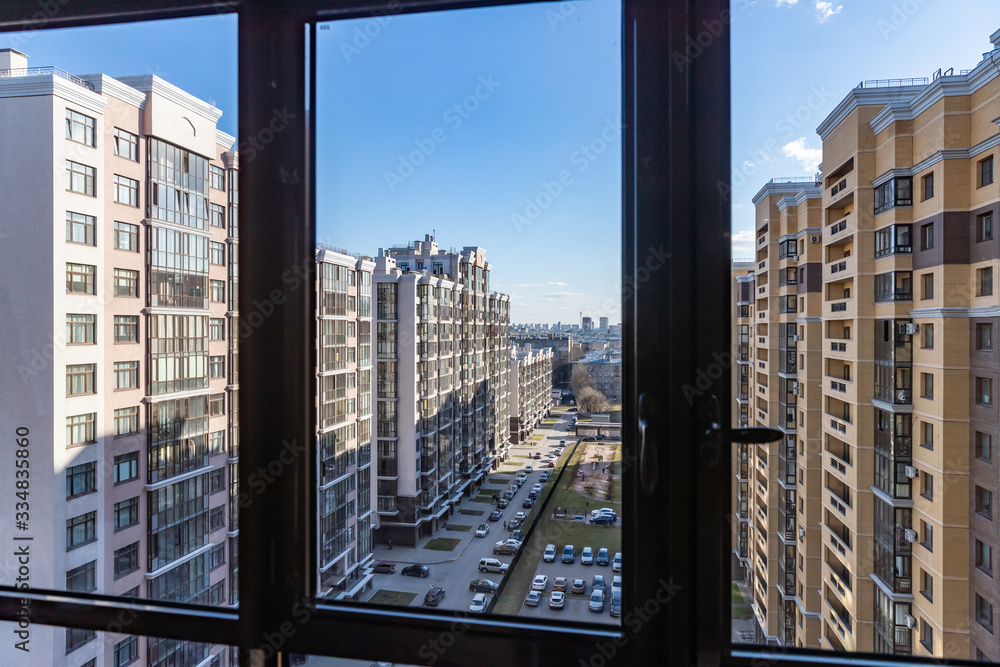 Colourful multi-storey complex of new buildings from balcony, Top view ...