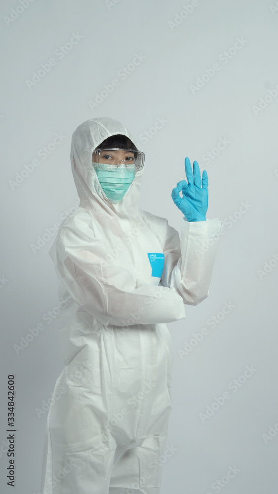 Asian doctor woman wear PPE suit or Personal Protective Equipment and ...