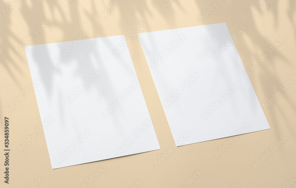 Blank paper poster flyers letterhead on orange textured background with ...