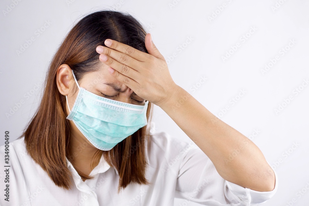 Health concepts, women wearing sanitary masks and handles in the head ...