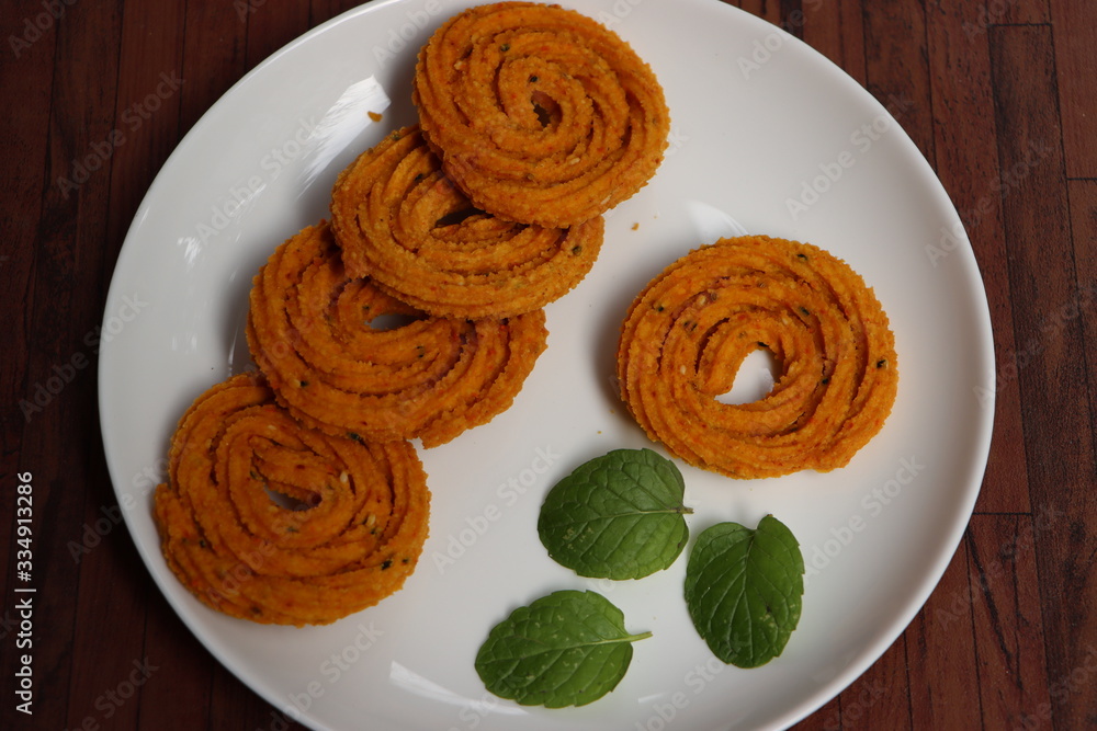 Chakali, murukoo, spiral maharashtrian snack made with gram flour Stock ...