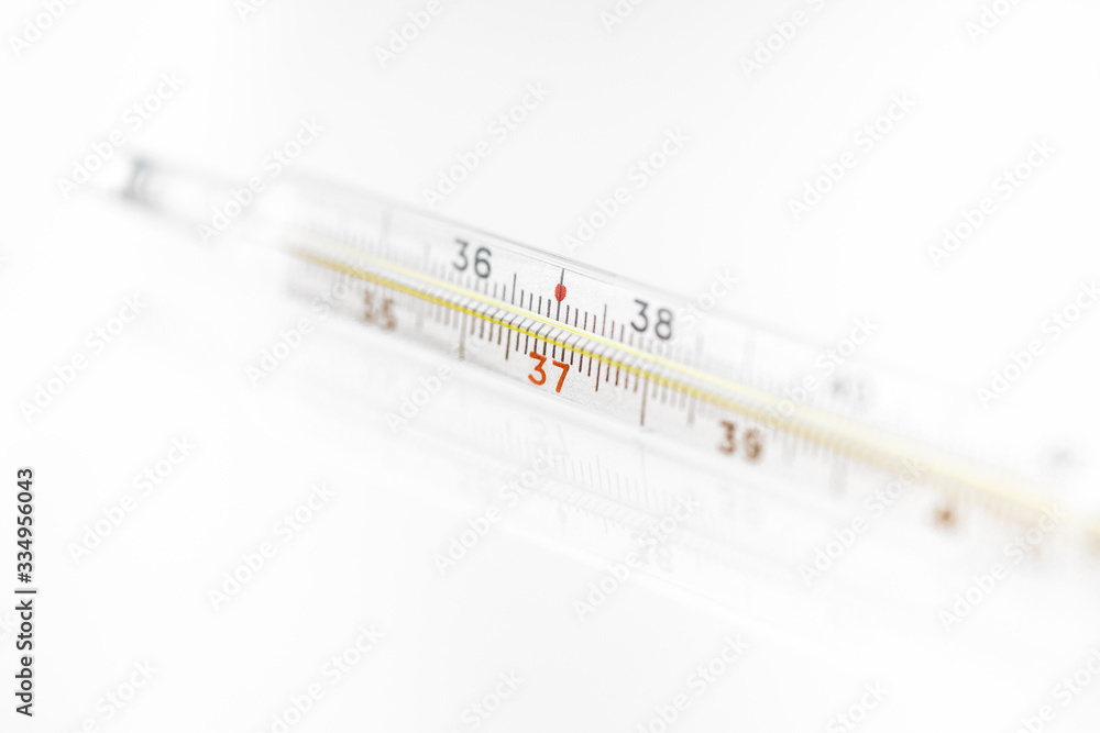 mercury thermometer with inclined measuring scale and marked value of ...