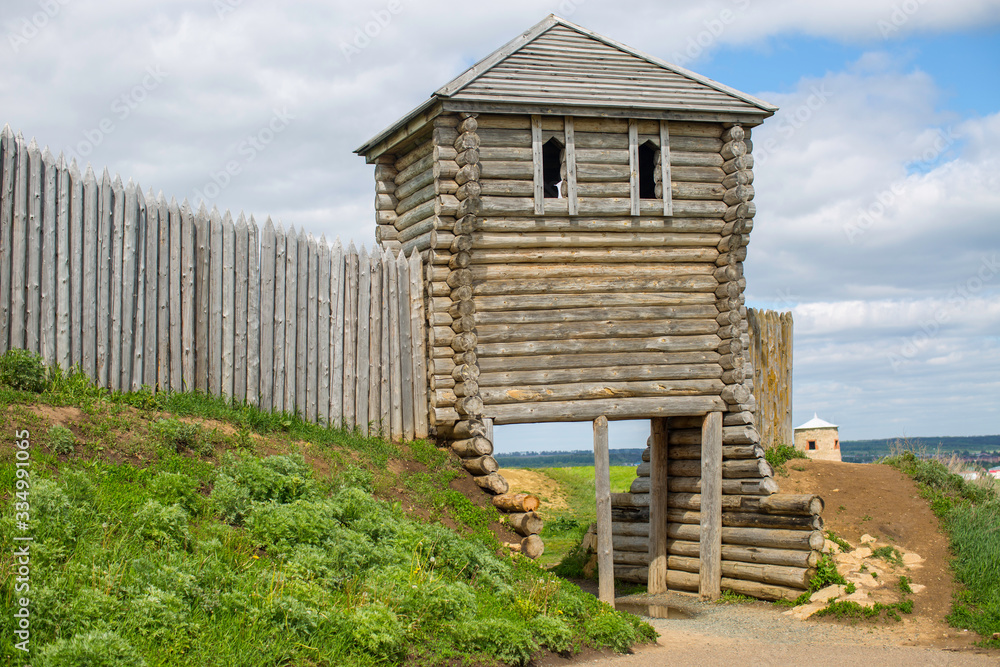 wooden tower and fortress wall, a log of sharpened logs A Stock Photo ...