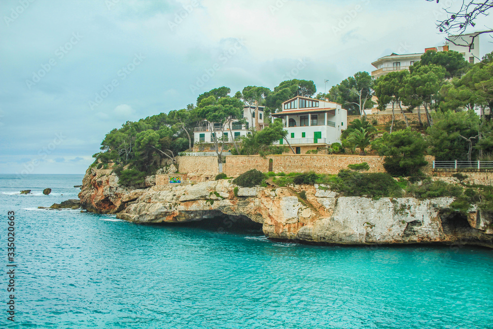 Cala Santanyi - beautiful scenery with houses on cliffs in Santanyi ...