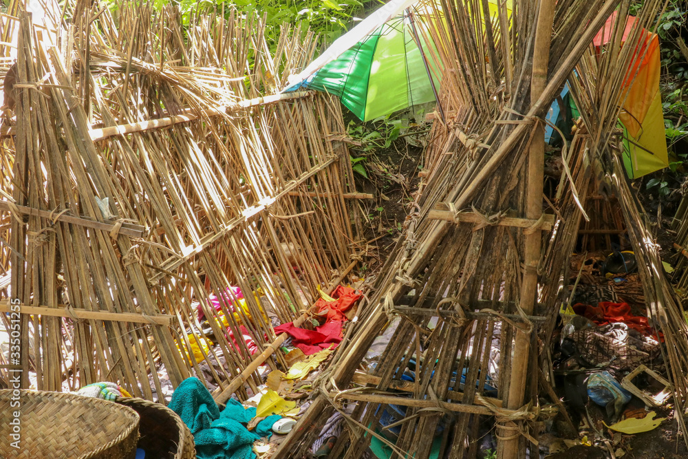 Grave of bamboo sticks in a cemetery in Terunyan village. Traditional ...