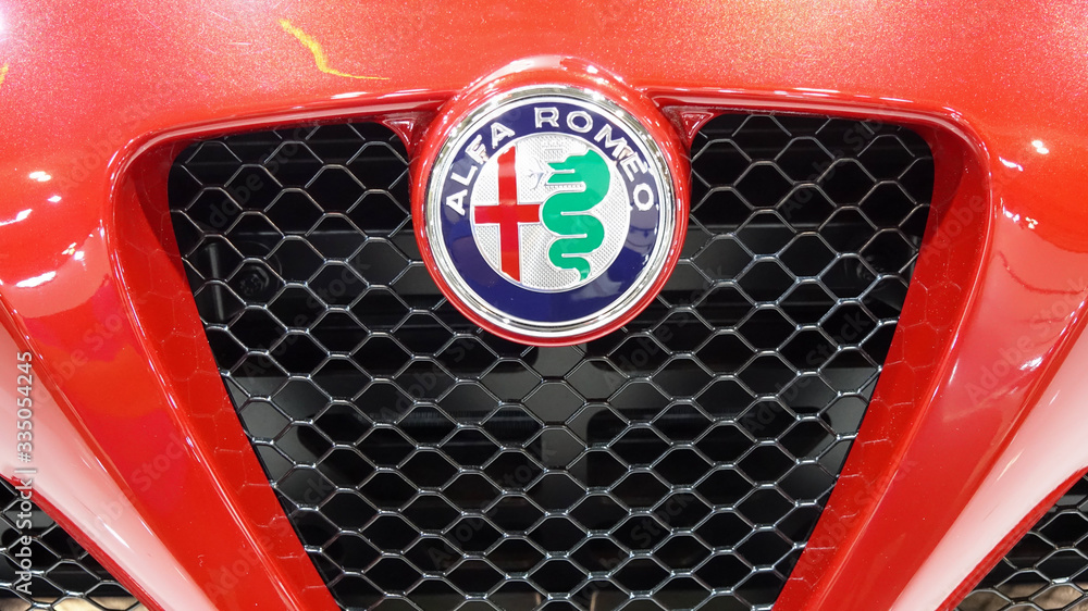 Alfa Romeo logo or sign in a red car, Toronto, Canada Stock Photo ...