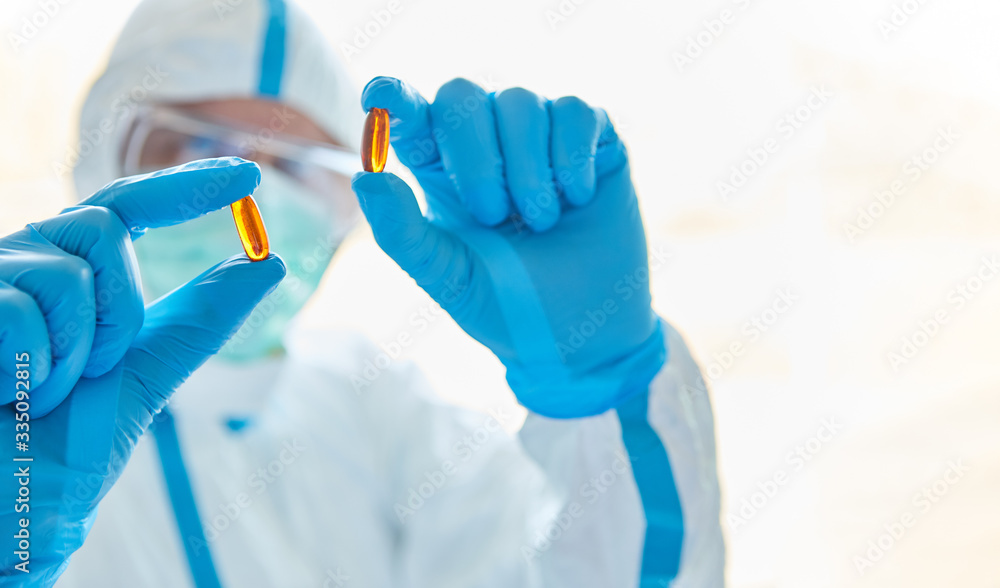 Researchers in the laboratory with drug against Covid-19 Stock Photo ...