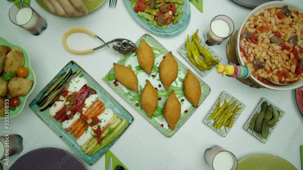 Top view of a traditional delicious Turkish family dinner table ...