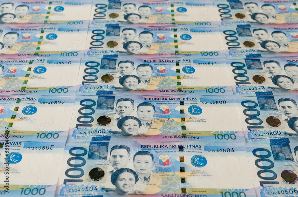 Flat lay view of 1000 Philippine peso cash Stock Photo | Adobe Stock