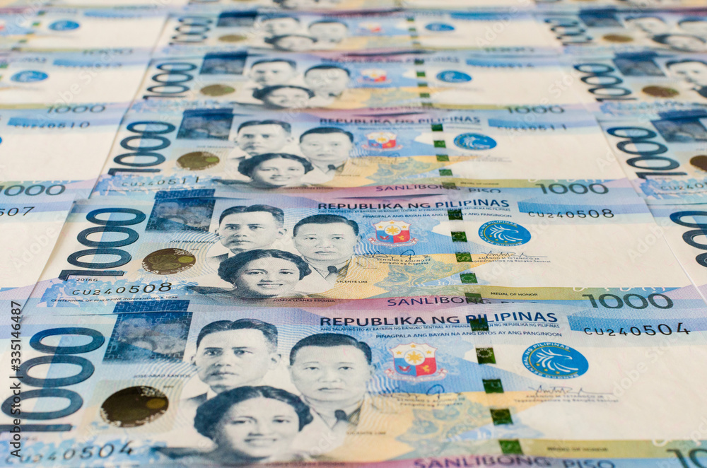 Flat lay view of 1000 Philippine peso cash Stock Photo | Adobe Stock
