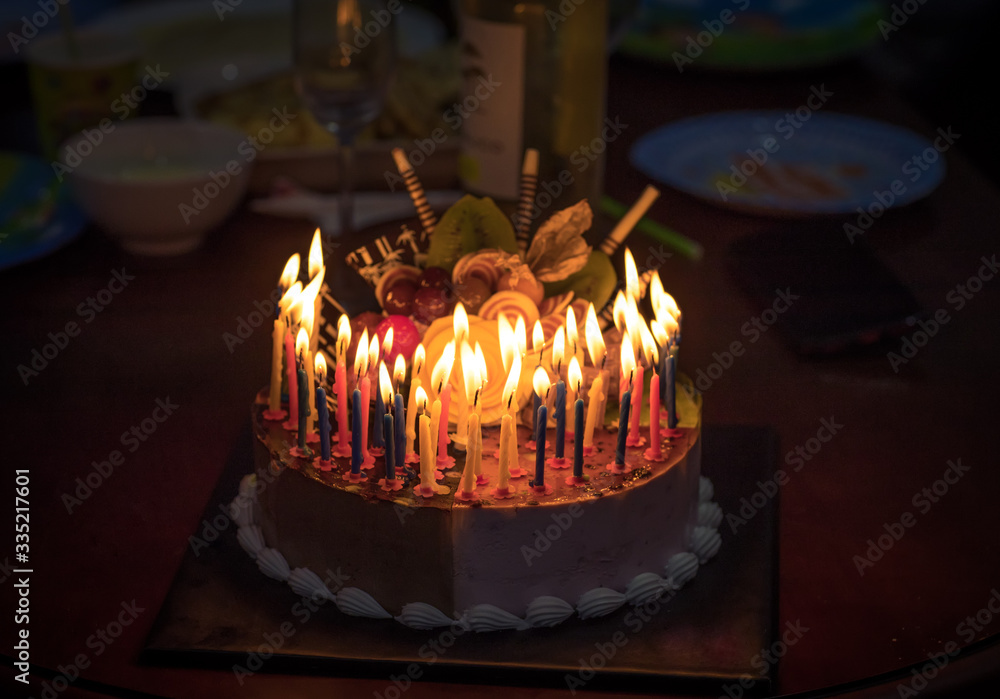 Birthday cake with candles Stock Photo | Adobe Stock