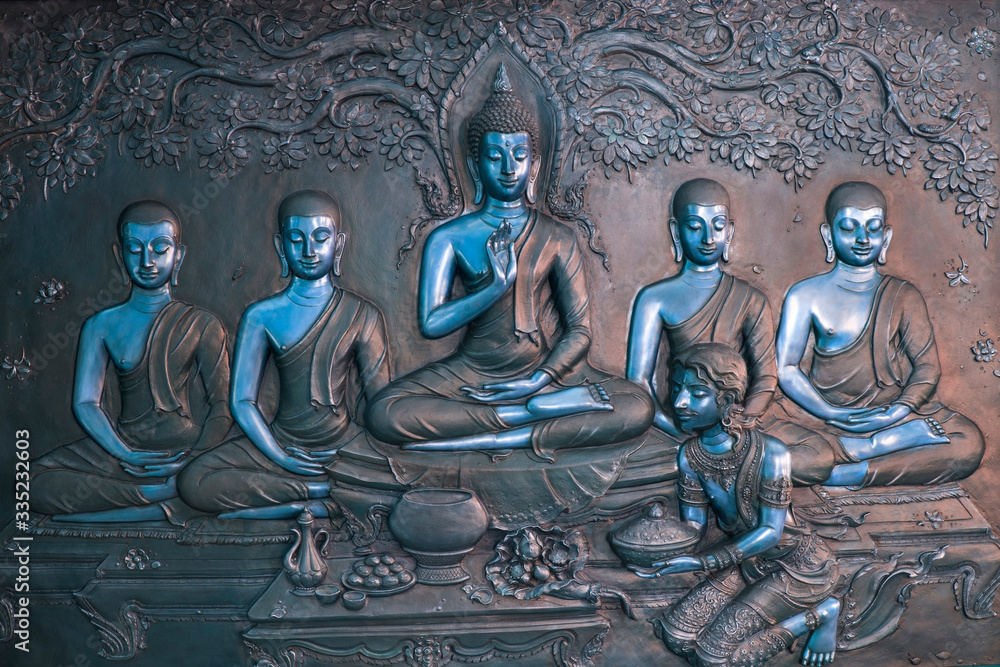 Buddha life scenes on carved metal at the temple in Thailand. Stock ...