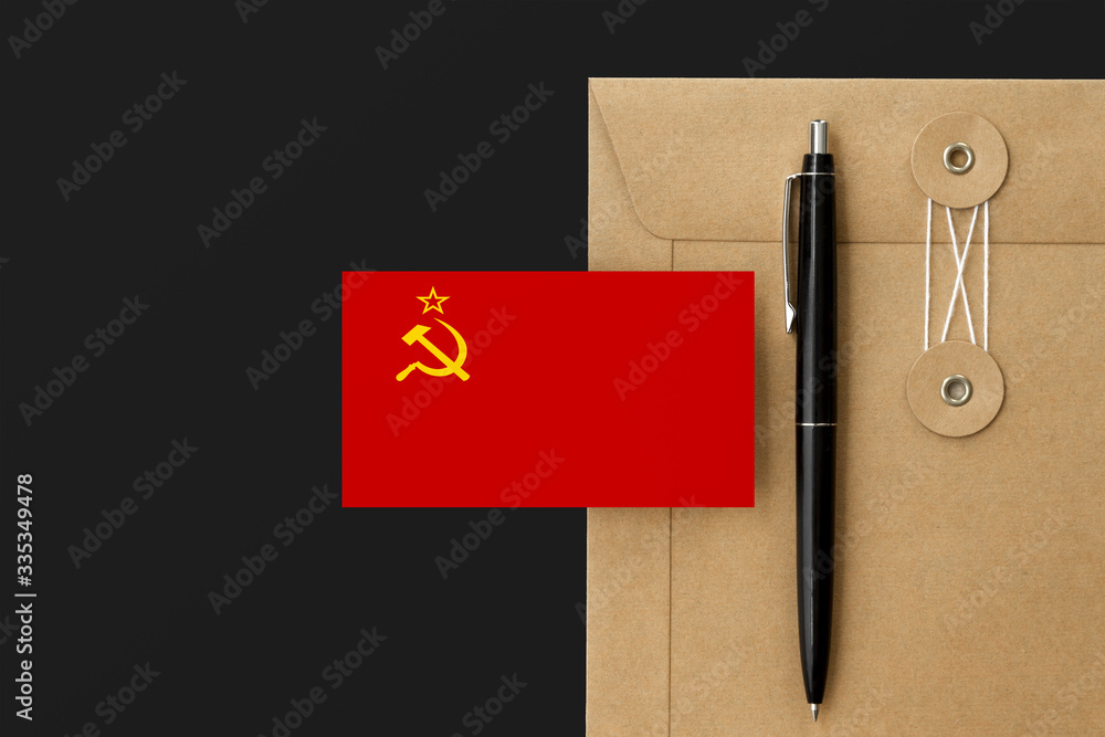 Soviet Union flag on craft envelope letter and black pen background ...
