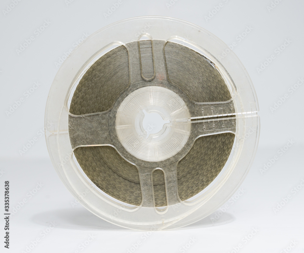 A beautiful clean vintage 8mm movie film reel with movie film on the ...