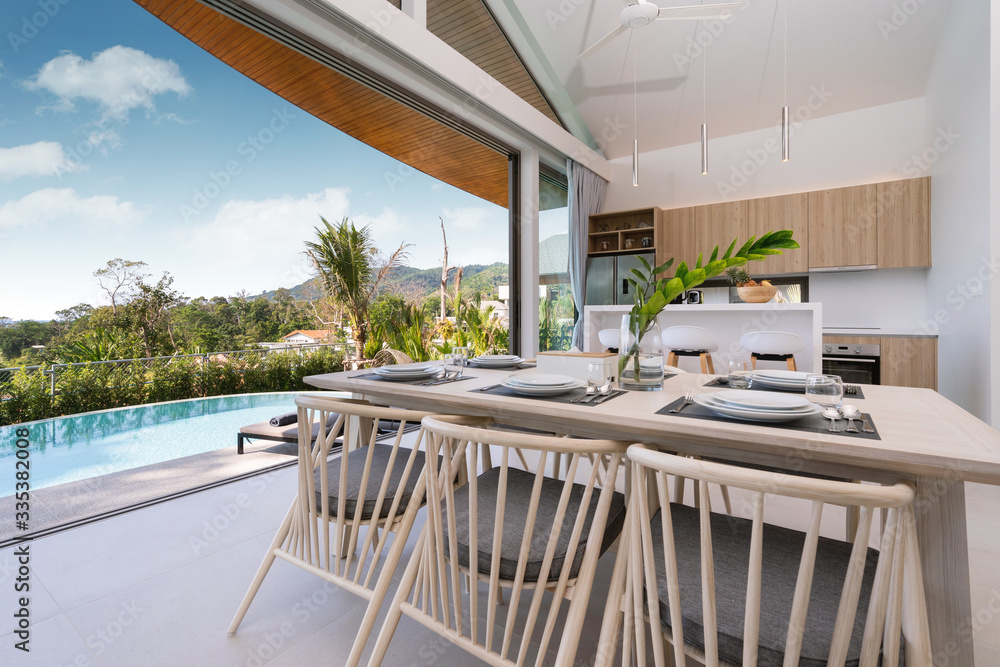 Interior design in pool villa, house and home feature dining table and ...