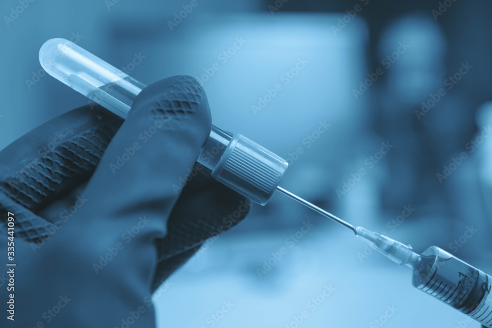 Coronavirus COVID-19 infected blood sample Test tube with blood sample ...