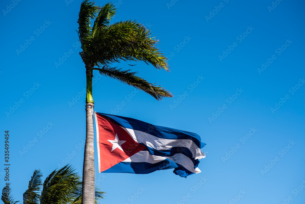 Cuba, a flag in the wind, a proud people, a revolution, a revolutionary ...