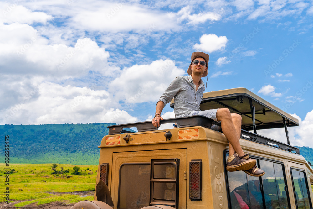 Safari animal explorer looking for a wildlife from the heep front row ...