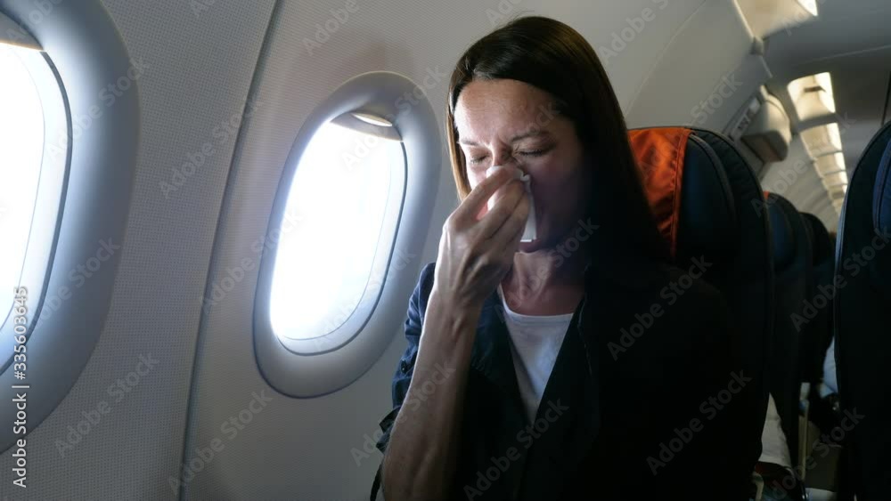 Unhealthy woman having rhinitis, suffering from snuffles. Sick girl ...