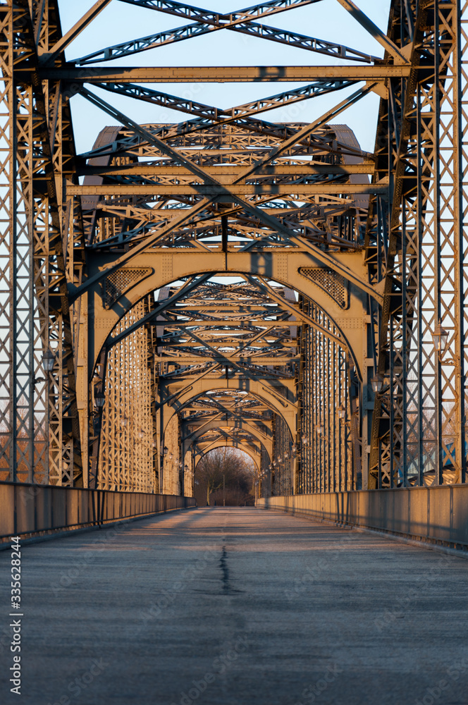 The old Harburger elbe bridge in a sunsetlight, a steel arch bridge ...