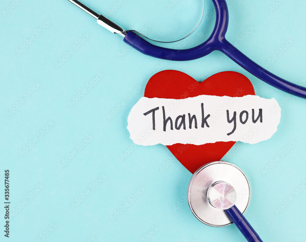 medical stethoscope, healthy red heart and the inscription Thank you on ...